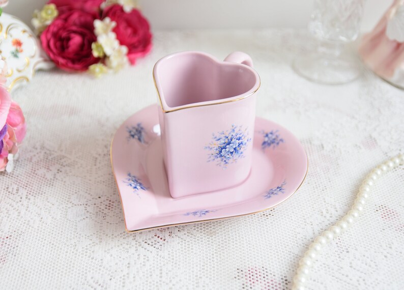 Heart-shaped Pink Cup and Saucer With Blue Floral Design and Gold Trim ...