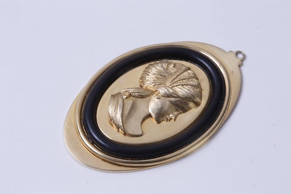 Pendant with woman's profile store