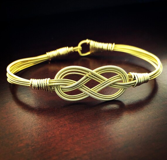Gold color guitar string bracelet