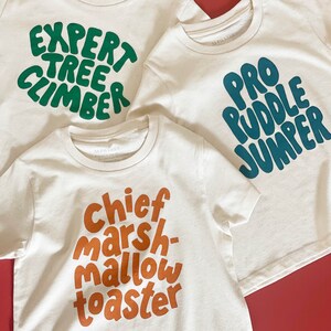 Chief Marshmallow Toaster Kids T-shirt - Natural Fleck - Funny Slogan T ...