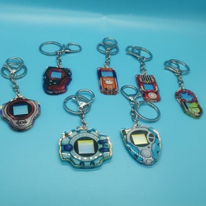 Digimon Keychains- 7 Digivices, Agumon, Gabumon, Gatomon, and Veemon - Etsy