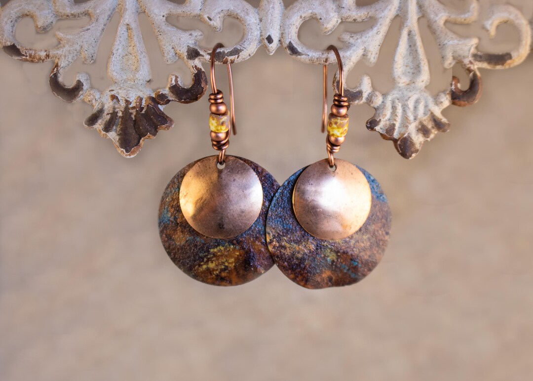 Salvaged Rusty Metal Circles Layered With Raw Copper Circles Hang From ...