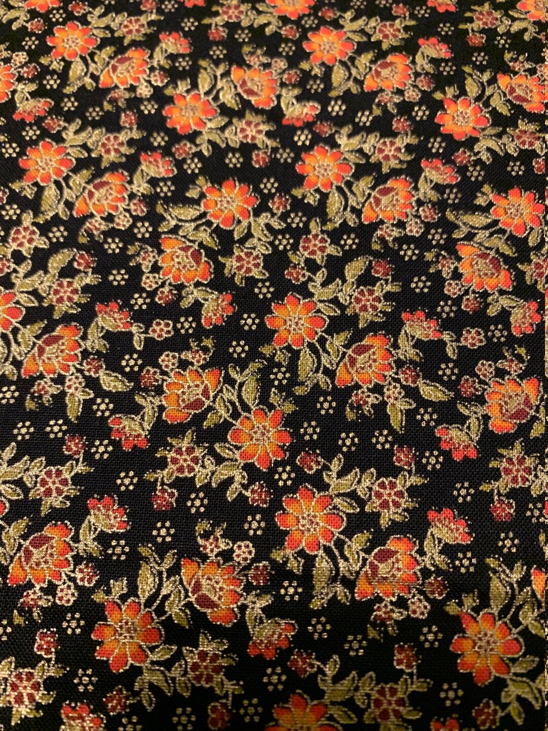 Small Orange and Rust Metallic Flowers on Black Background, Radiant ...