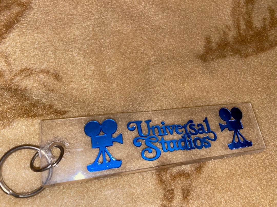 Vintage Universal Studios Keychain Plastic Rectangular 6 Blue Letters ...