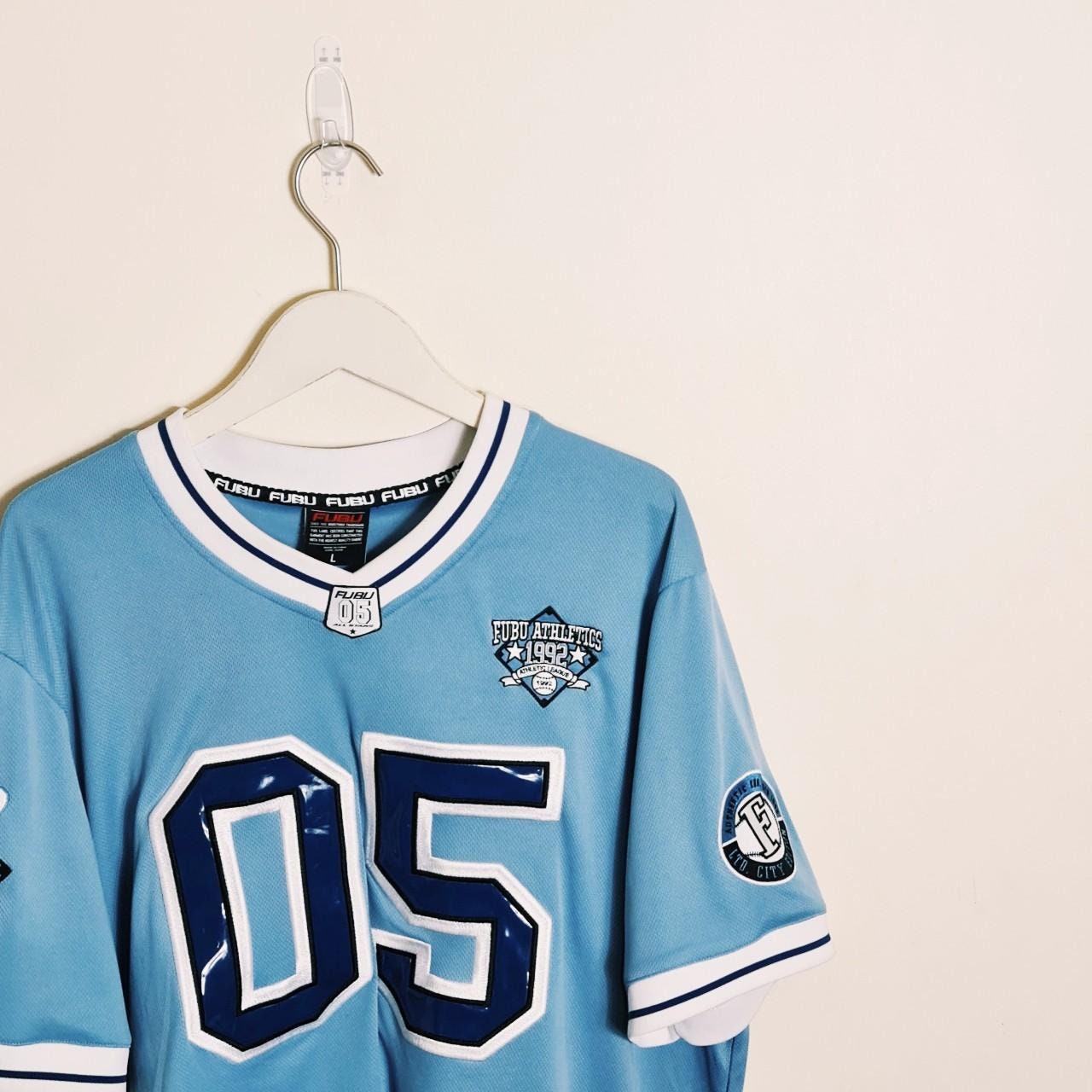 Vintage Y2K 90s 2000s Baby Blue and White Fubu Jersey. Fubu 05 Jersey Top. FUBU ATHLETICS 2005 ...