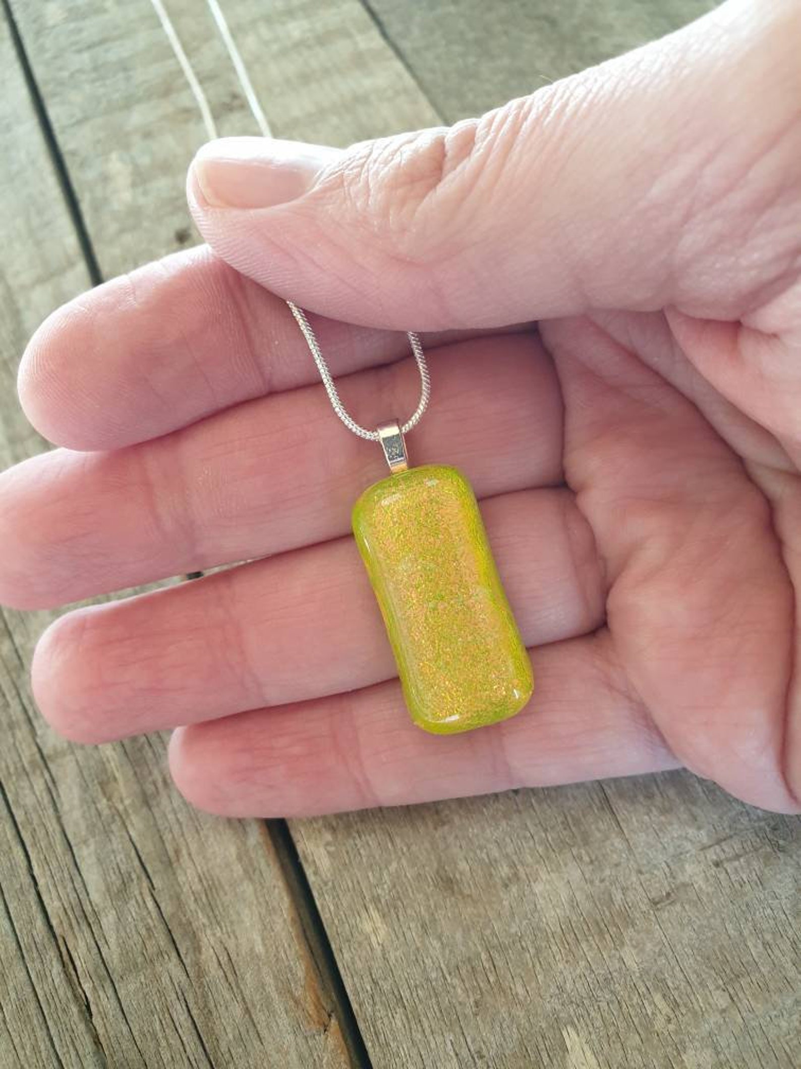 Amazing sparkling red and gold on neon green pendant. | Etsy