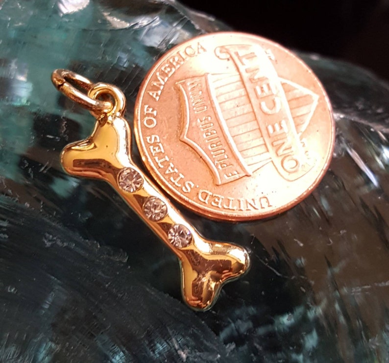 Gold dog bone charm with crystals tiny dogbone charm gold | Etsy