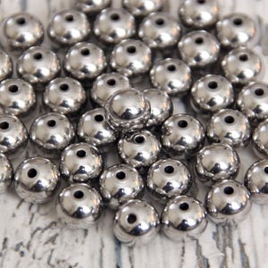 Engraved Round Beads. Customizable Logo Spacers. Wholesale Baubles ...