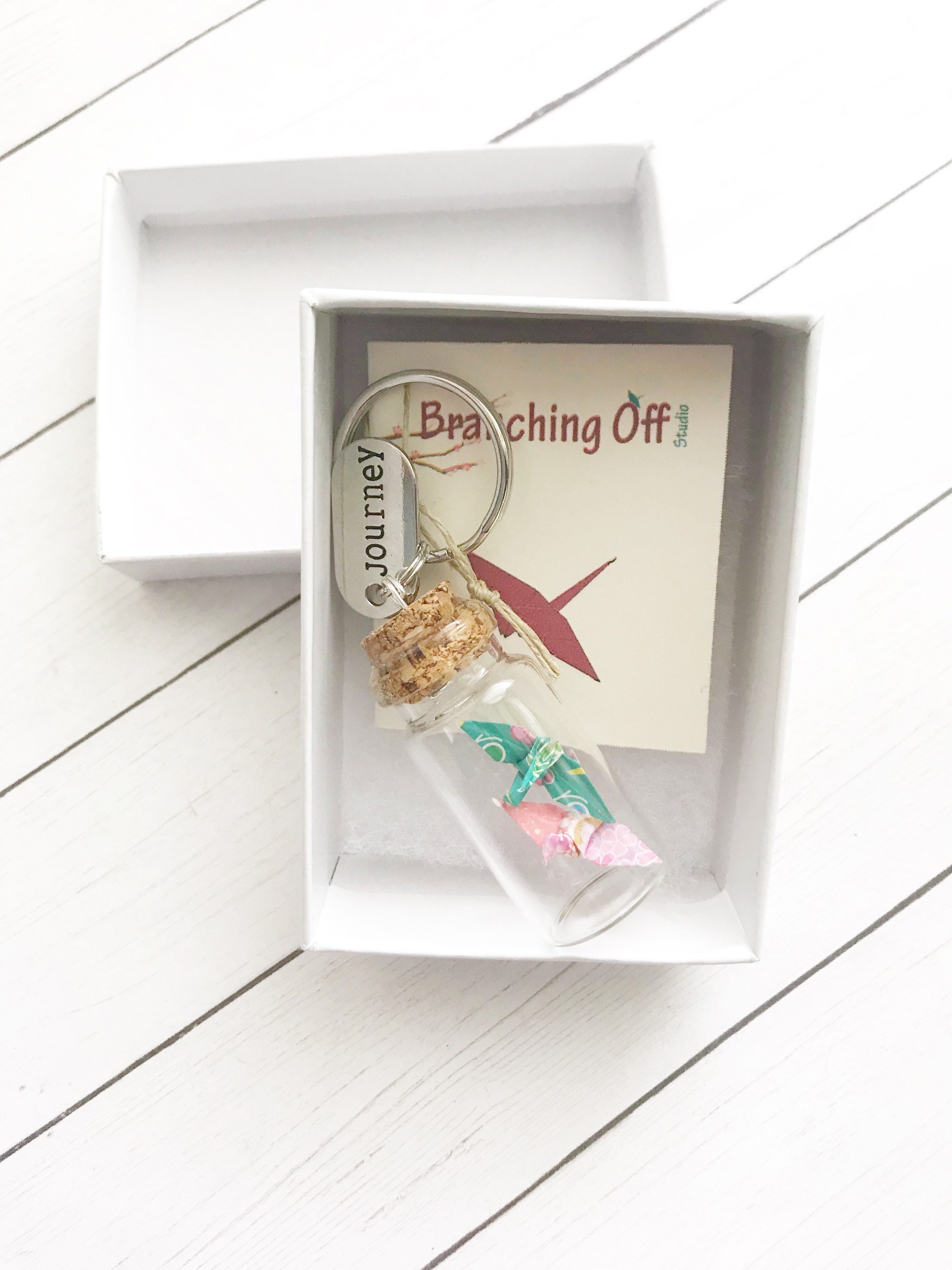 Key chain with origami crane and charm | Etsy