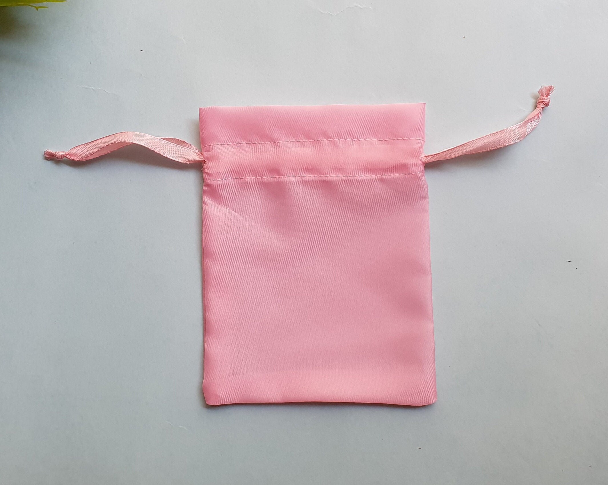 Set of 100 Drawstring pink satin jewelry pouch for prefect | Etsy