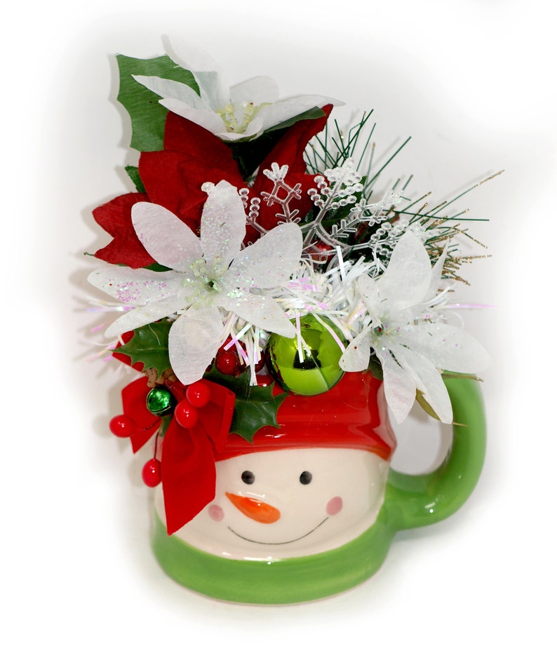 Holiday Floral Arrangement Centerpiece, Snowman Mug, Poinsettia Flowers ...