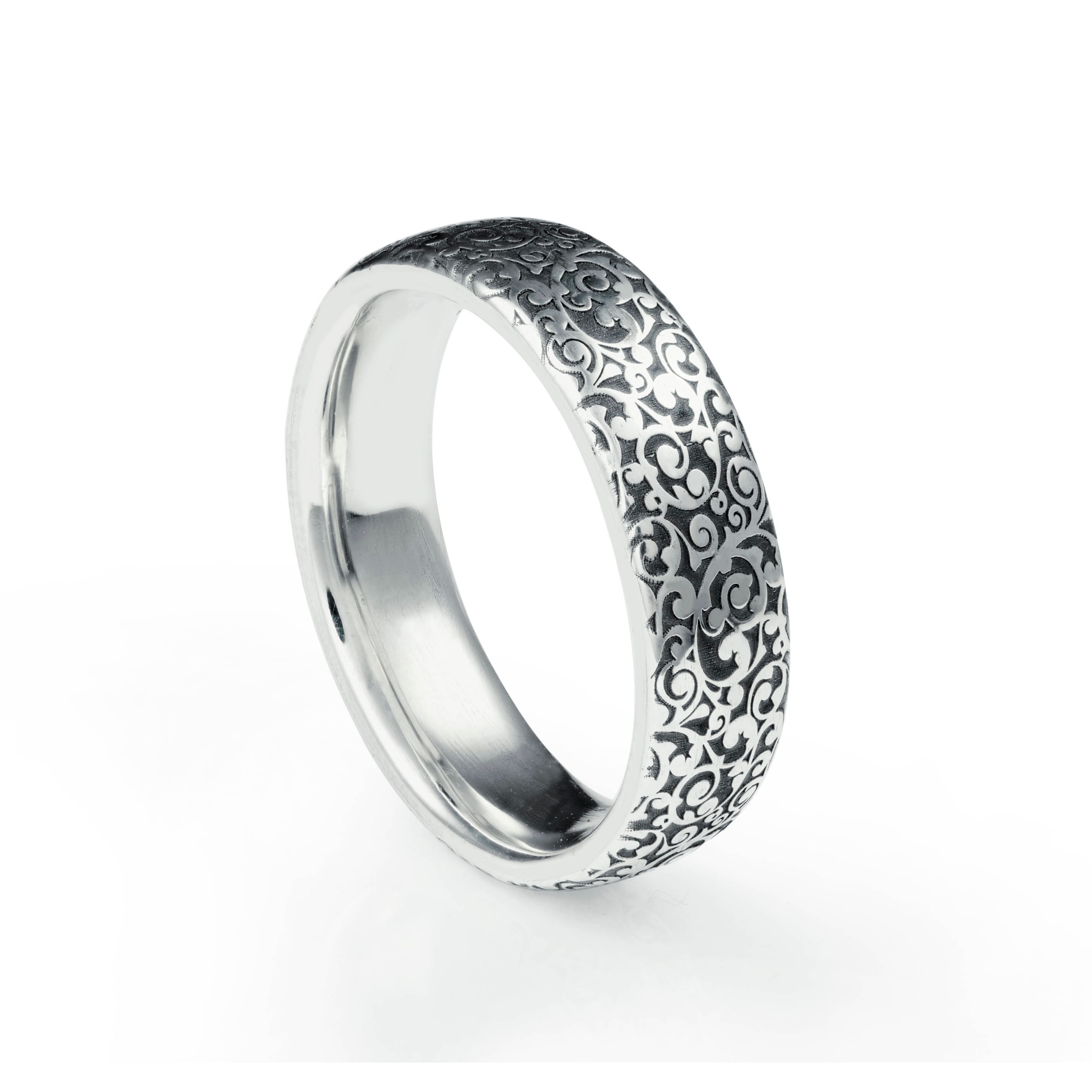 A platinum wedding ring with a laser engraved scroll motif. | Etsy