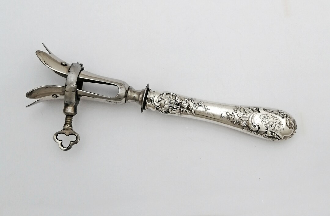 French Sterling Silver Handled Bone Holder, Manche a Gigot Rococo Decor ...