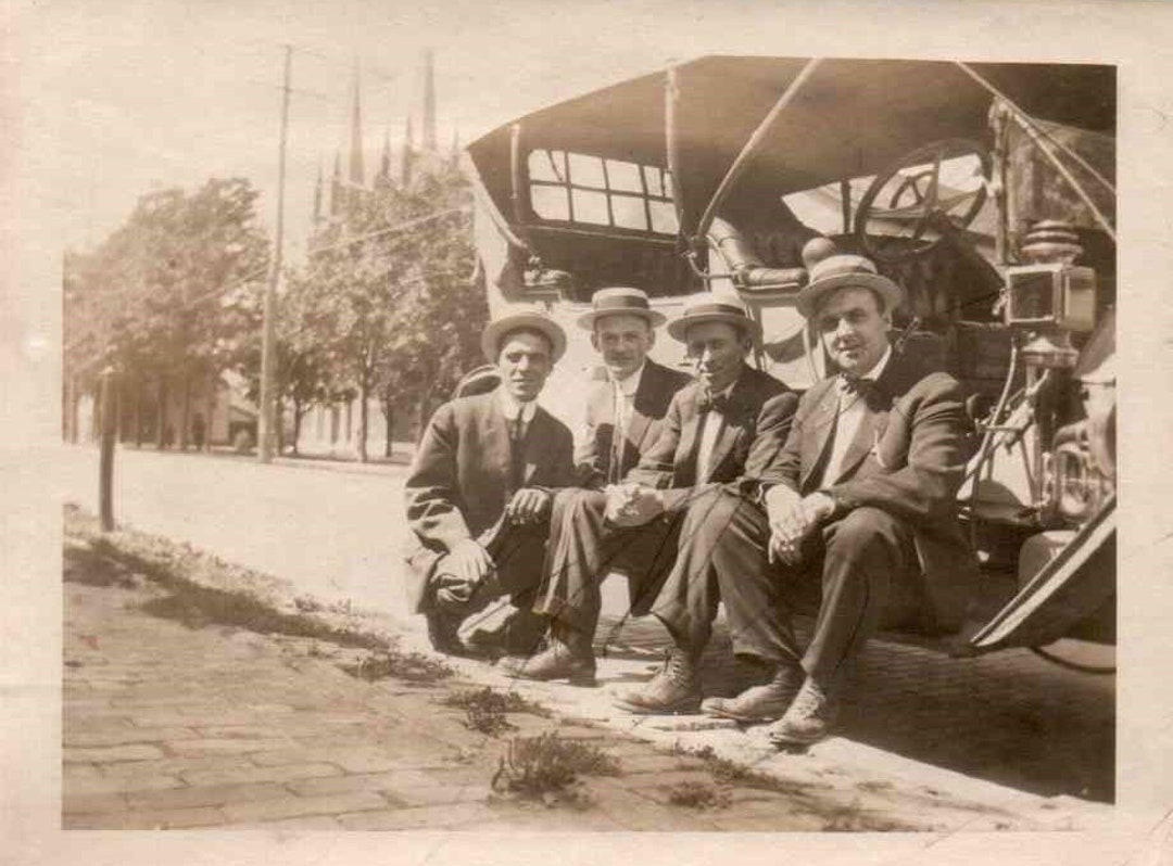 Photo 1910-1920 Men Sitting on Runner of Old Auto Wearing Hats Photo ...