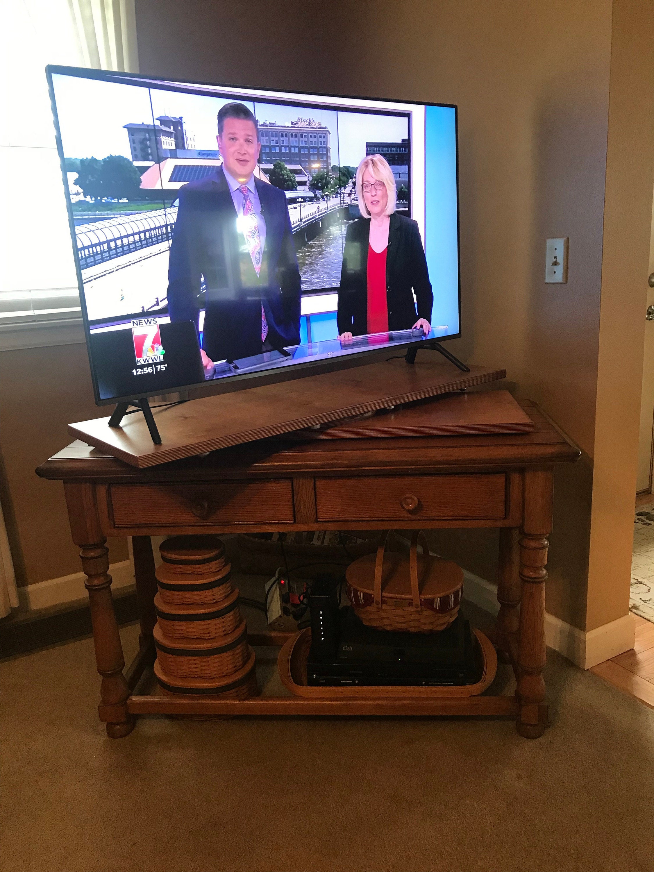 Swivel entertainment center store