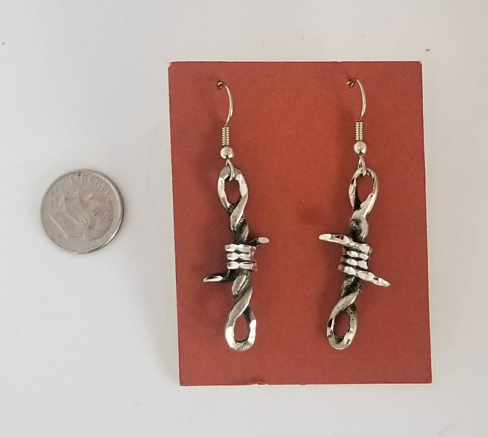 Barb wire earrings | Etsy