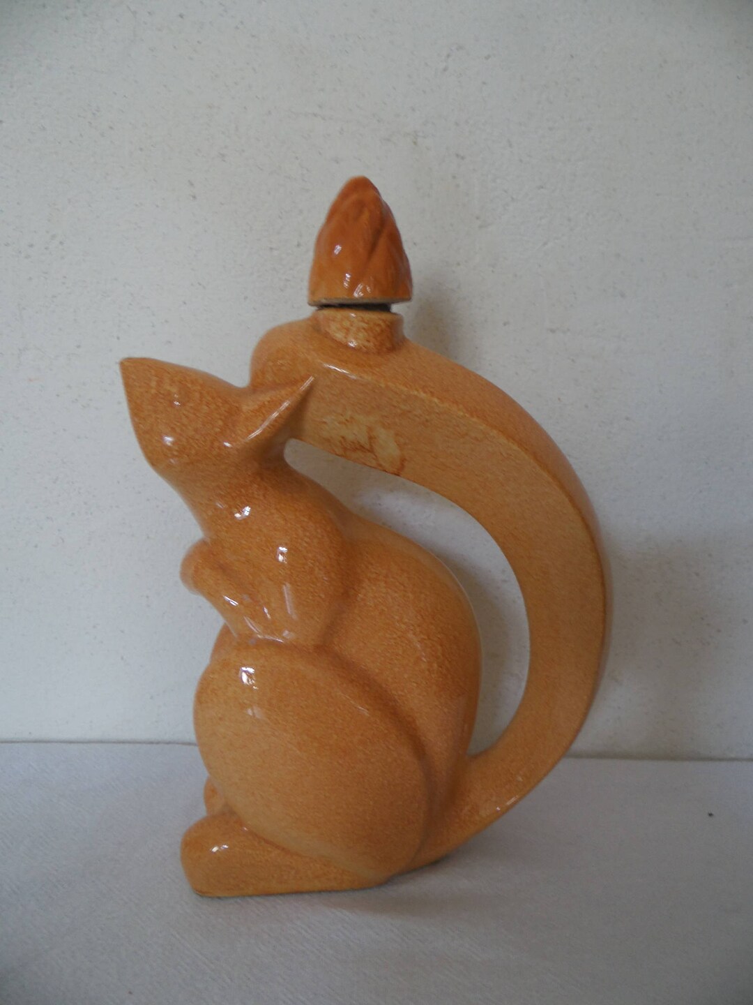 Carafe ceramique forme ecureuil, couleur orange moucheté, capuchon ...
