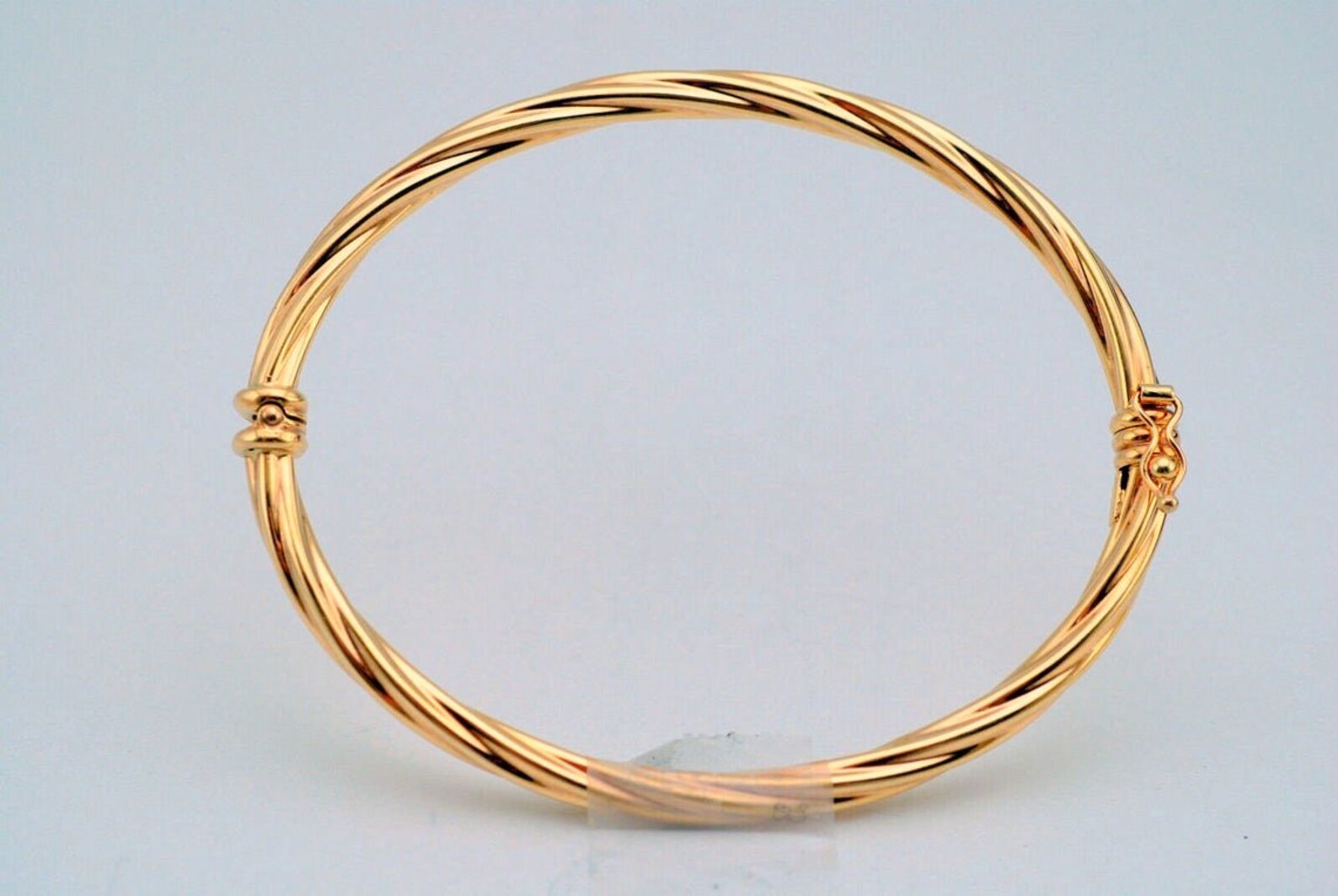 10K gold twisted bangle / bracelet | Etsy