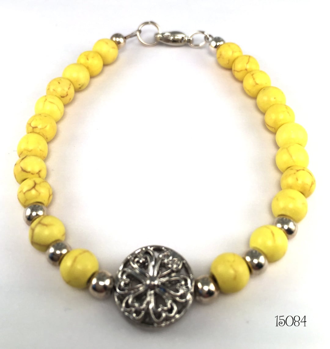 Cheerful Sunny Yellow Beaded Bracelet Featuring a Distinctive Silver ...