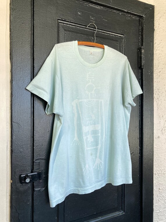 Kokopelli art graphic t-shirt - Gem