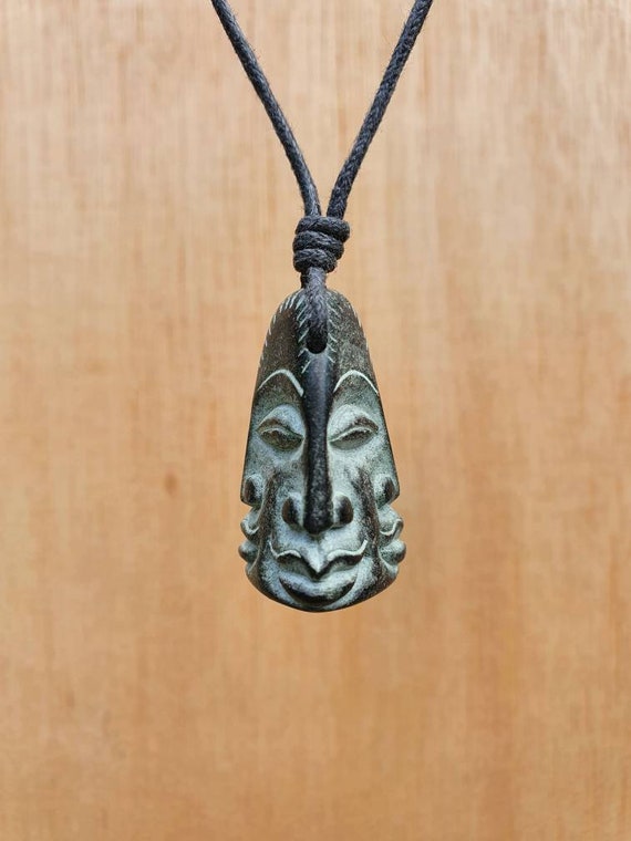 Carved stone pendant store