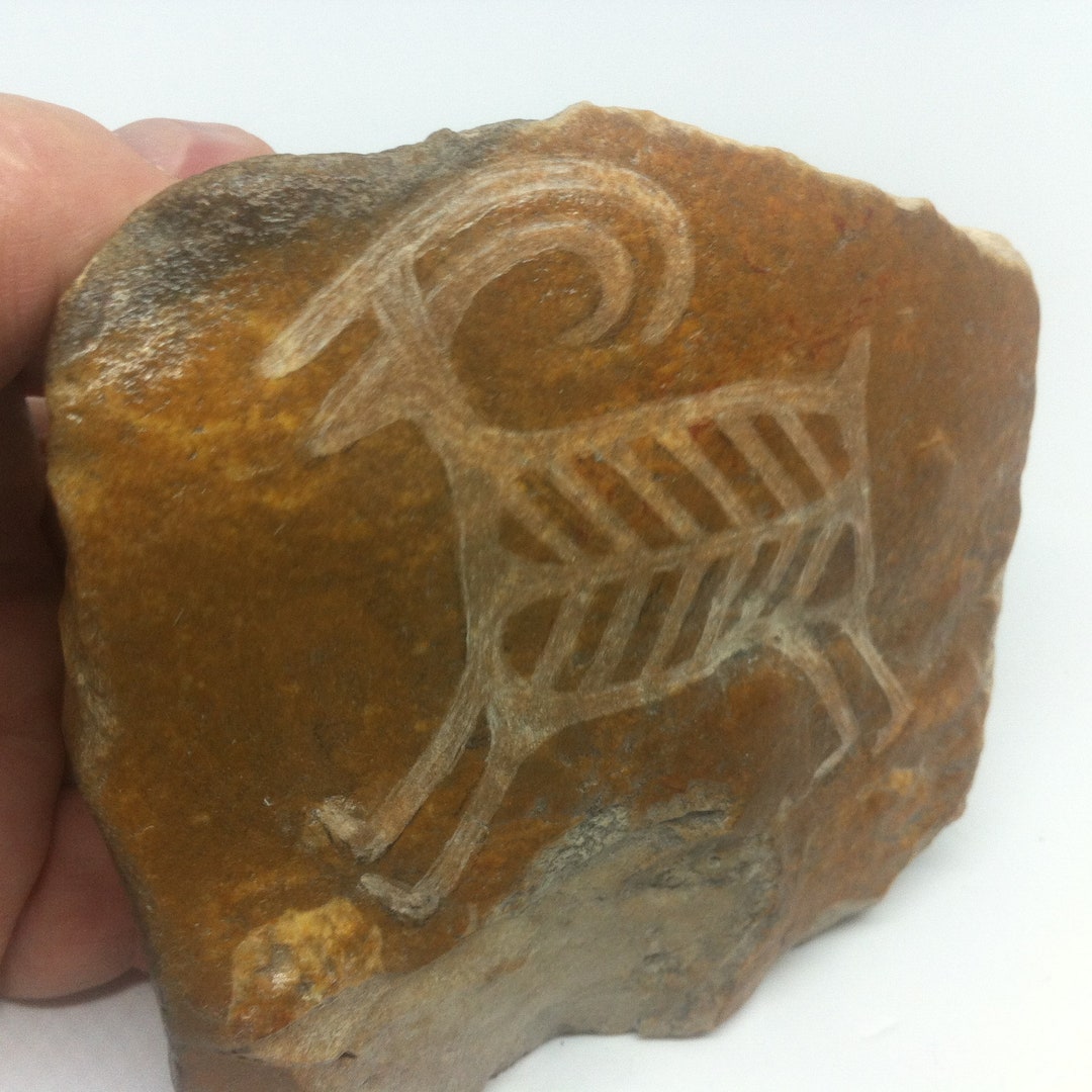 Stone Engraving: Mountain Goat Petroglyph Based Upon Ancient Motives of ...