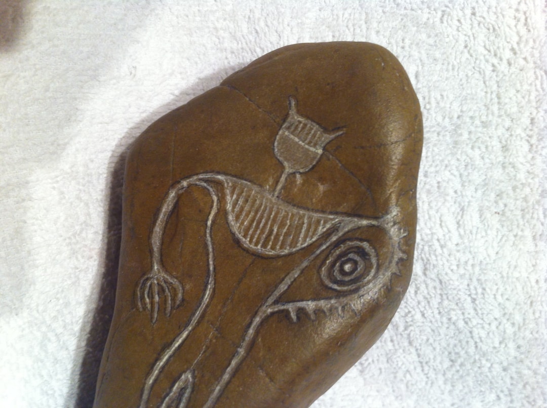 Shaman Stone: A Shaman With the Sun Symbol Under His Arm - Etsy