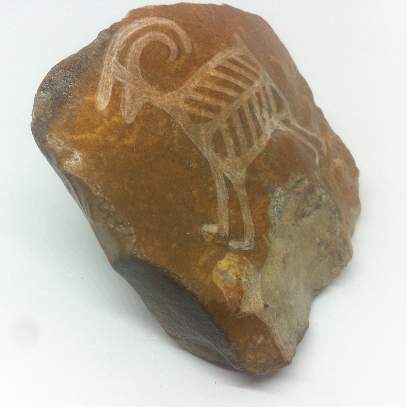 Stone Engraving: Mountain Goat Petroglyph Based Upon Ancient Motives of ...