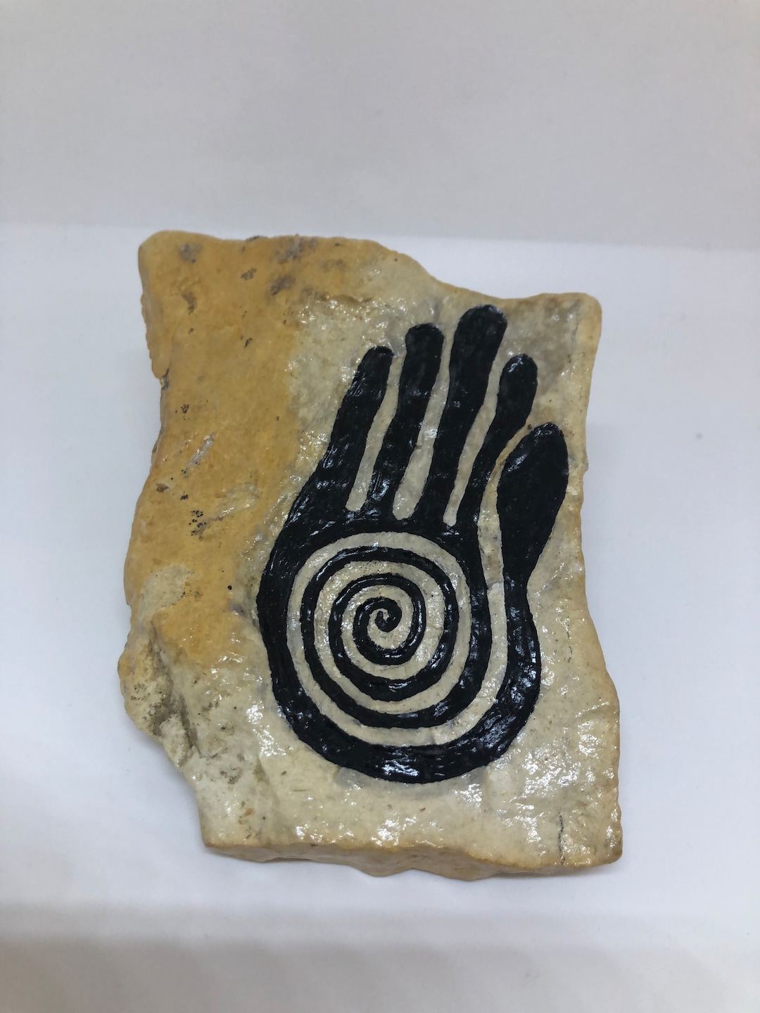 Petroglyph: Mystic Healing Hand Symbol With the Spiral of Eternity ...