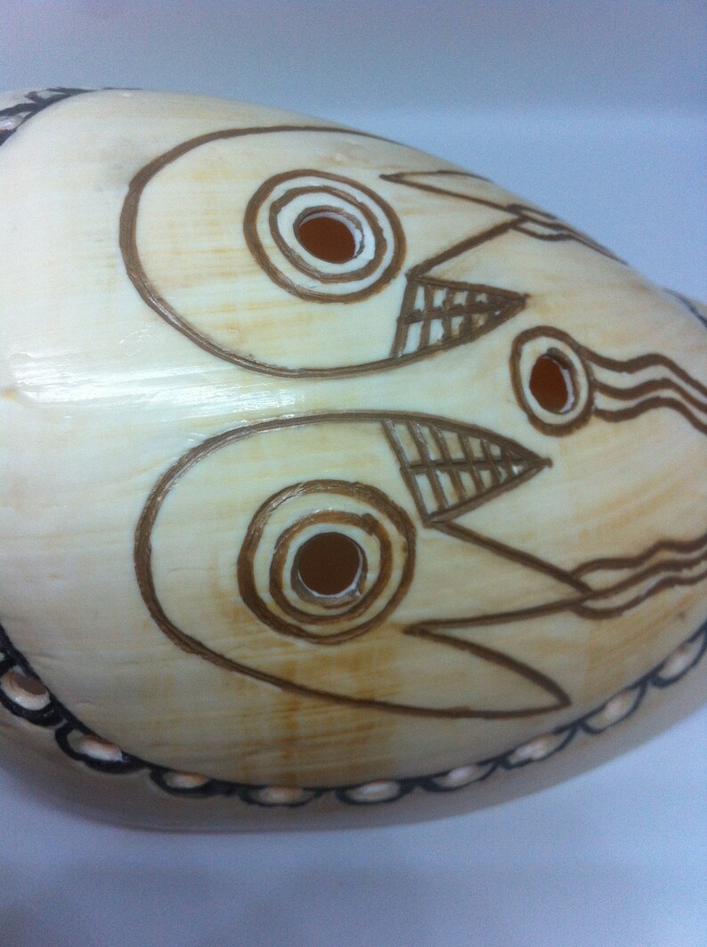 Engraved Melo Shell: Replica of a Shaman's Head With the Weeping Eyes Motif of the Mississippi ...