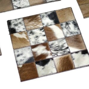 Square Nguni Cow Hide Patchwork Placemats. Each Mat Made of 16 ...