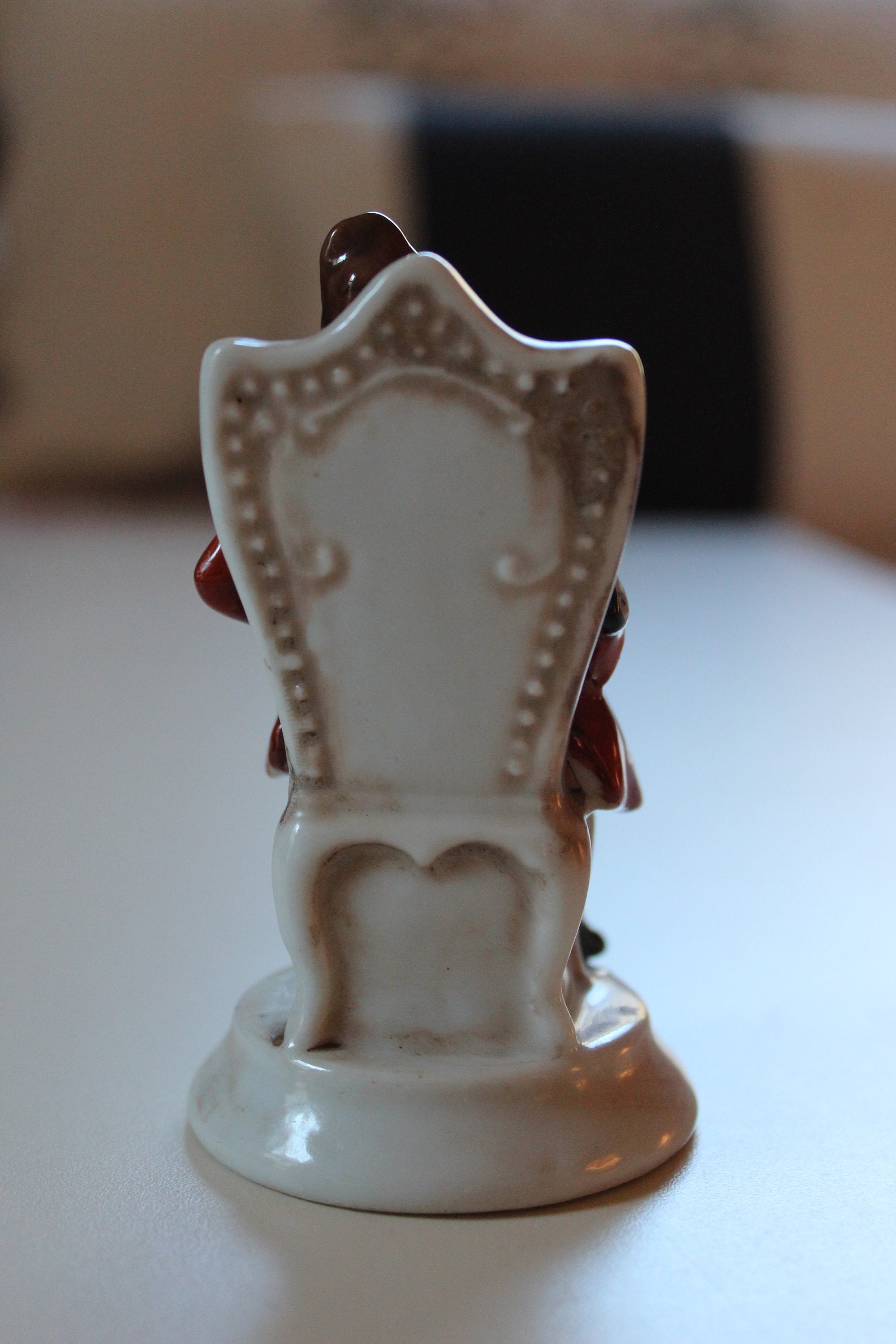 Colonial Porcelain Figurine of Seated Man - Etsy