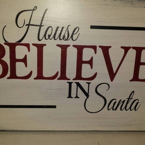 This House Believes in Santa Claus Distressed Wood Sign Rustic ...
