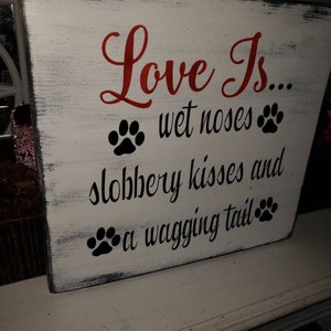 Love is Wet Noses Slobbery Kisses and a Wagging Tail Distressed Wood ...