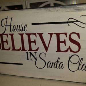 This House Believes in Santa Claus Distressed Wood Sign Rustic ...