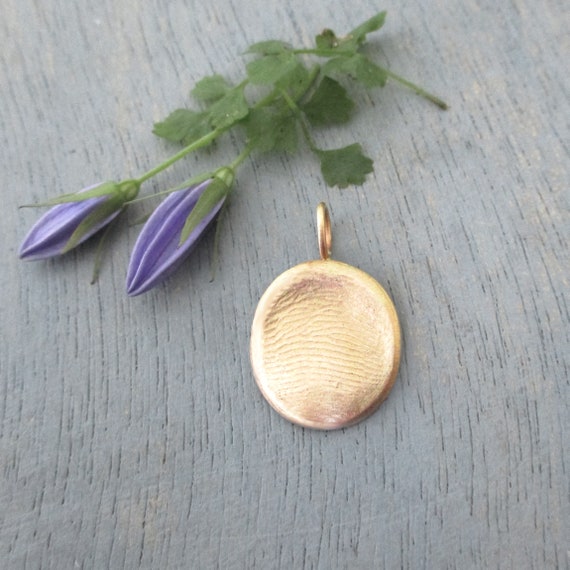 Thumbprint pendant store
