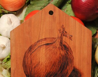 Drawings of whole vegetables burned into woodware by VegetableJoe