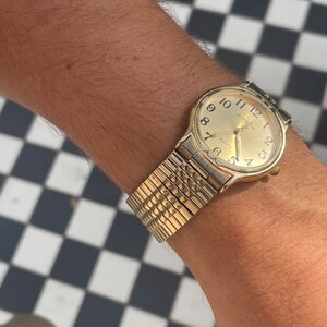 Vintage 1980s Men’s Gold Tone Stretchy Strap Analog Quartz Wristwatch ...