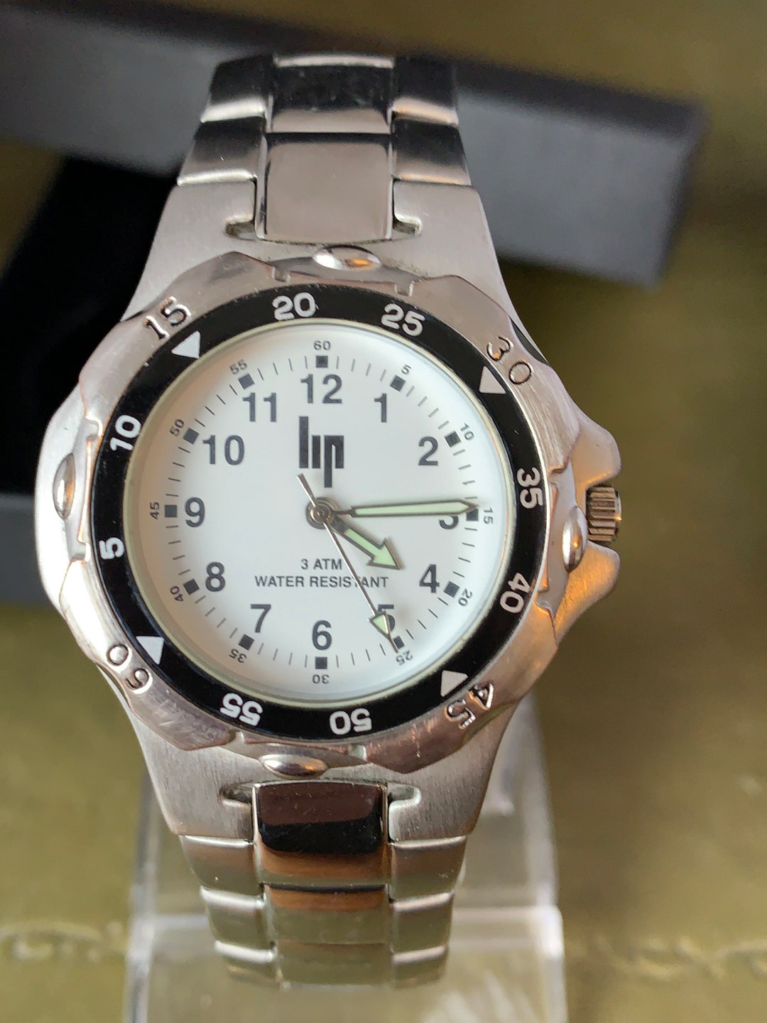 LIP Fashion Watch With White Dial & Movable Bezel - Etsy