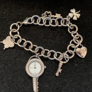 MARCEL DRUCKER Ladies Silver Tone Tone Key Charm Bracelet Quartz Watch ...