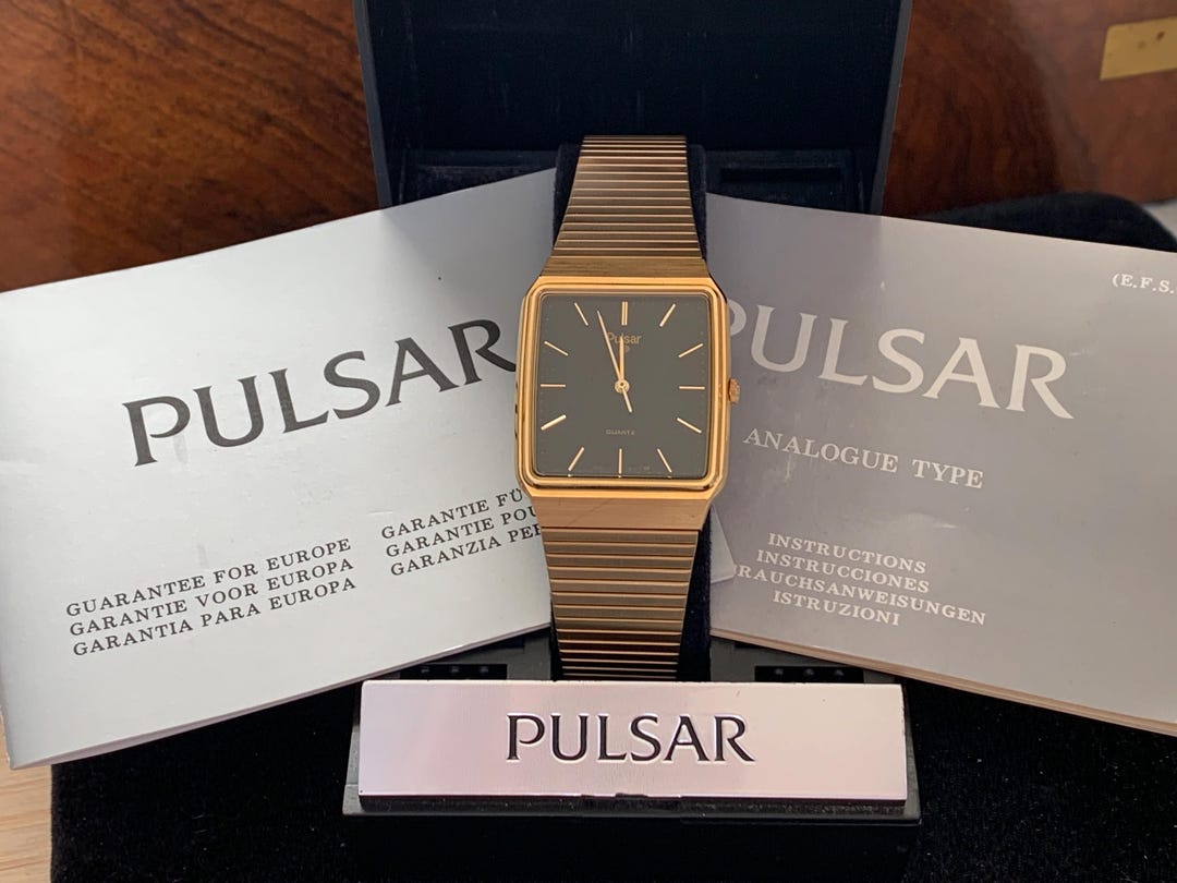 Beautiful Pulsar by Seiko RECTANGULAR Gold Tone Black Dial Unisex Dress ...