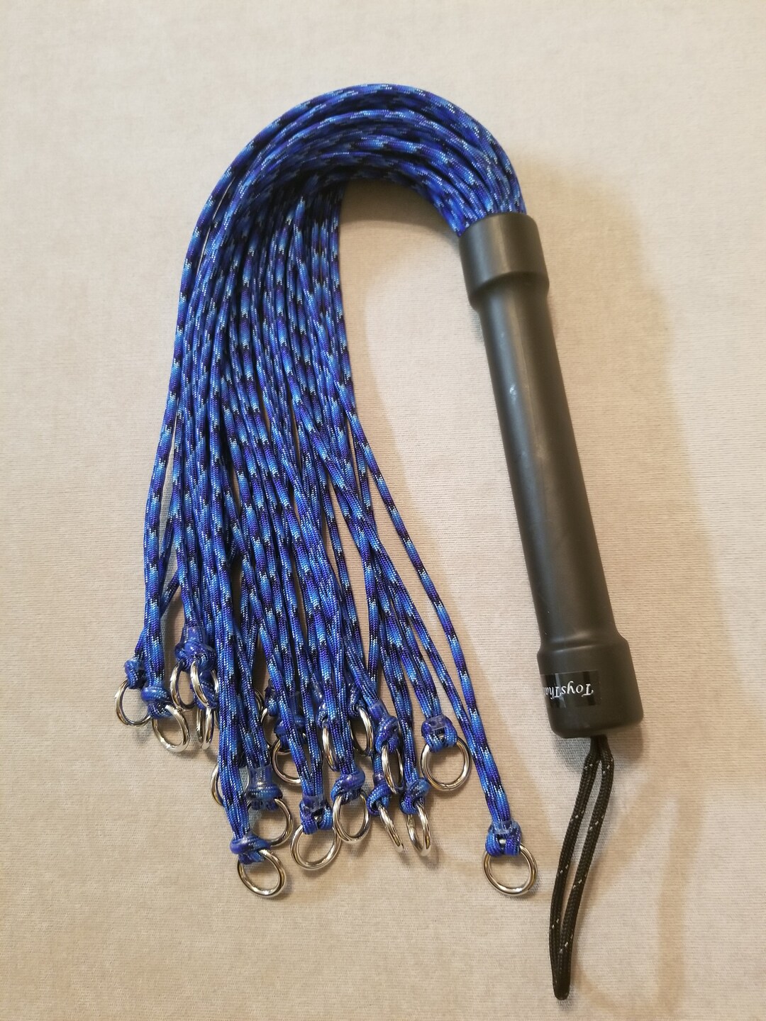 FPMR16B - Paracord Flogger 16" Blues and Black With a Black Handle With ...