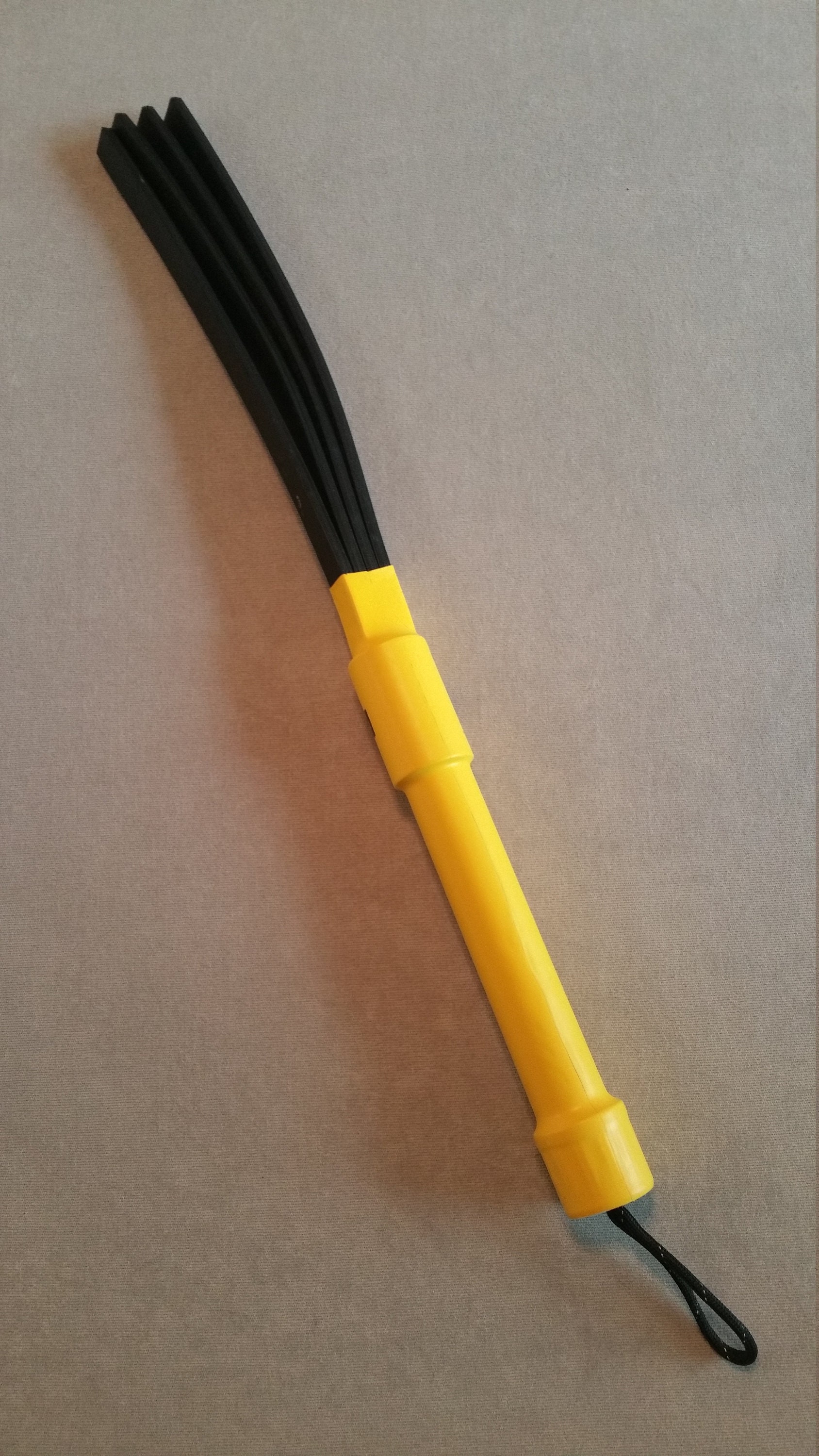 Rubber Slappers in Various Lengths and Handle Colors for BDSM Impact ...