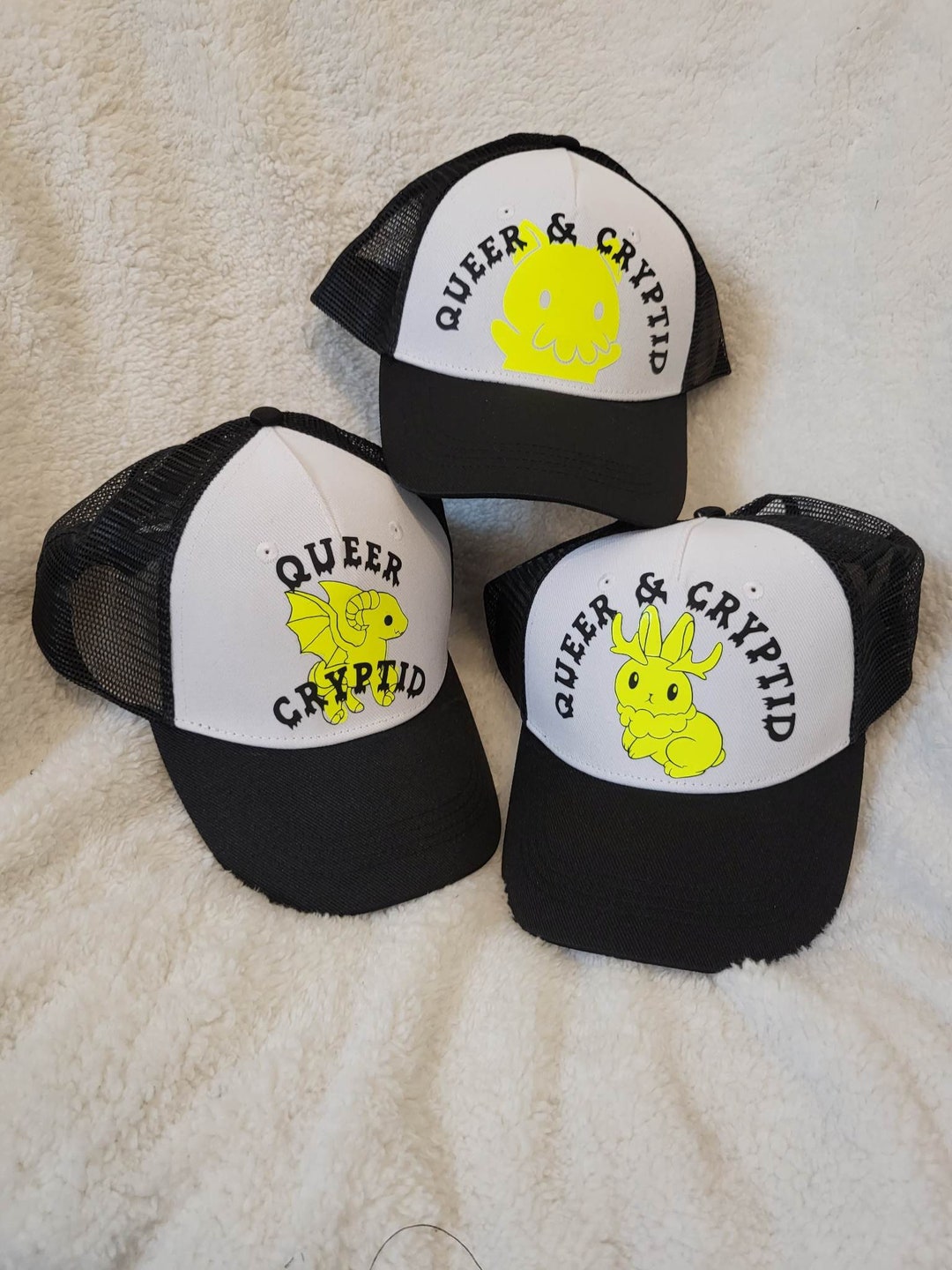 Queer and Cryptid Hats - Etsy