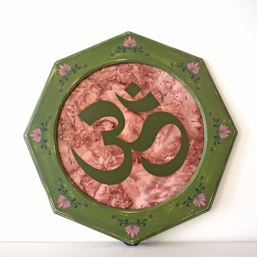 Om Wall Art - Om Symbol Over Pink Batik Background in Green Frame ...