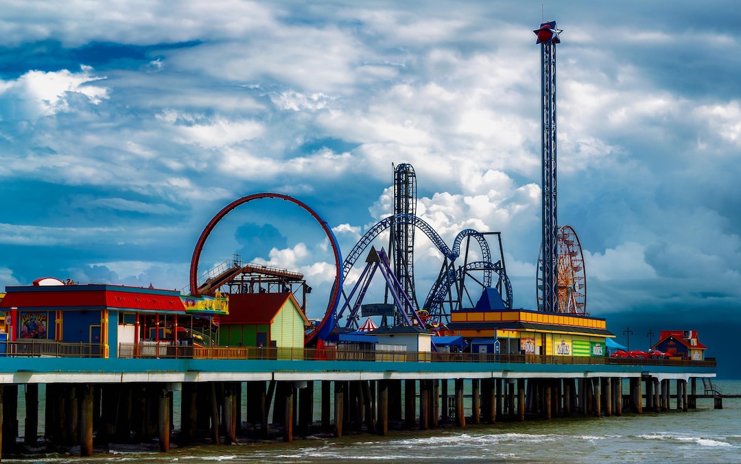 Vibrant Galveston Pleasure Pier With Roller Coasters and Ferris Wheel ...