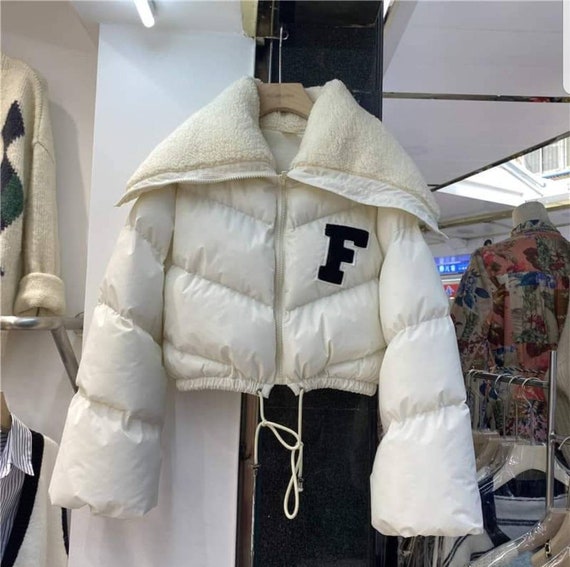 The Best White Puffer Jackets To Get You Through Winter