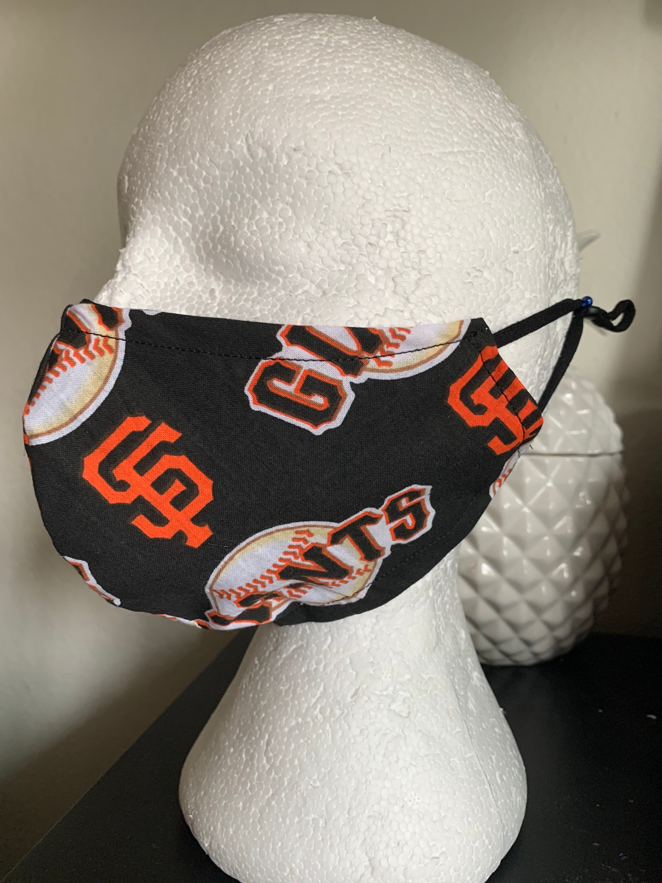 The San Francisco Giants Baseball With Black Reversible Face Mask ...