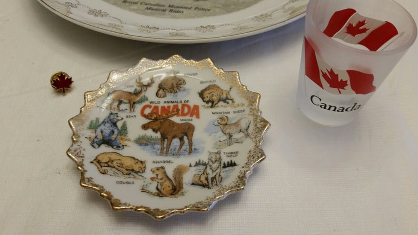 4 antique canada souvenirs canadian mounted police & animal | Etsy