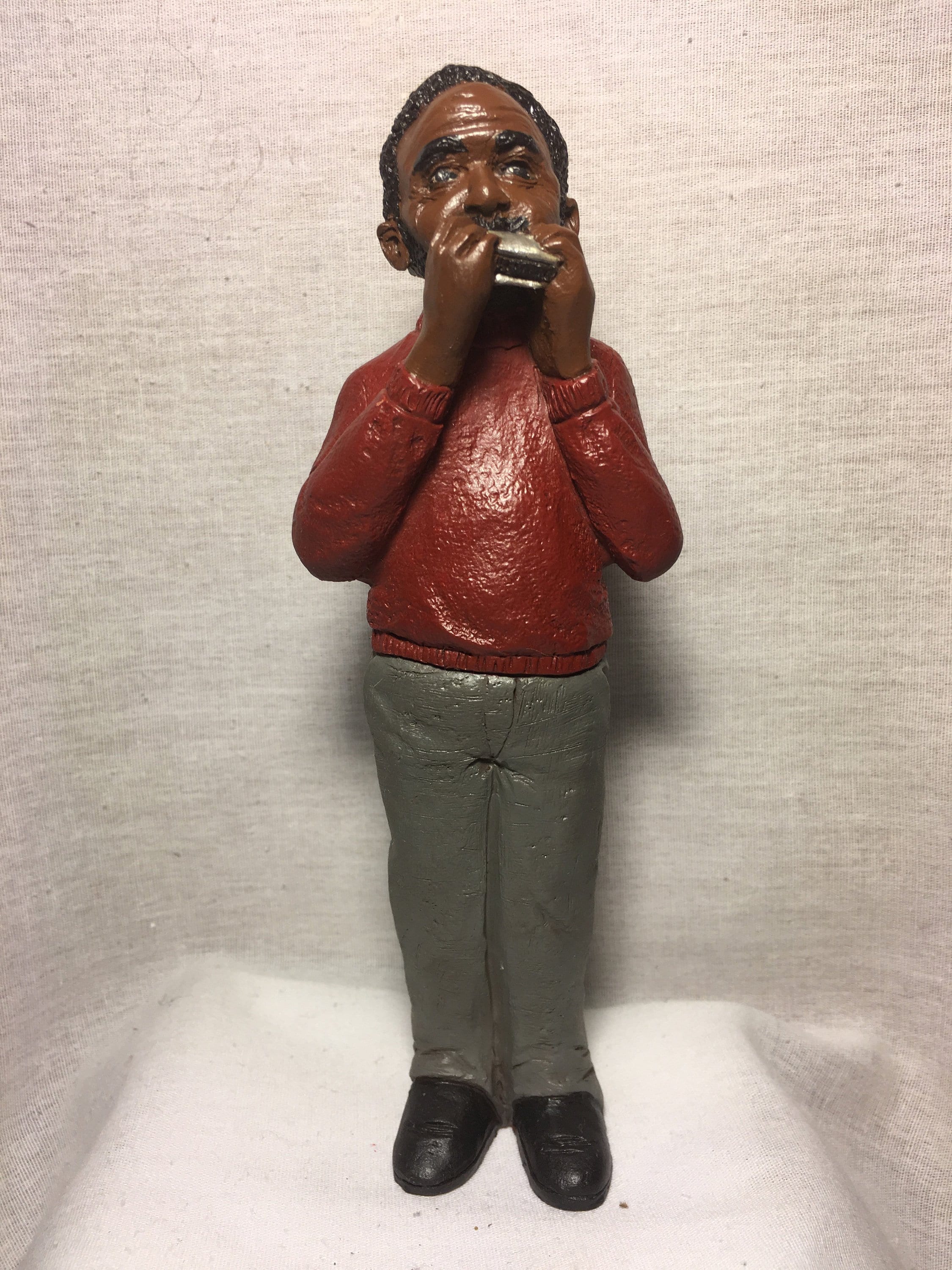 Man Playing Harmonica
